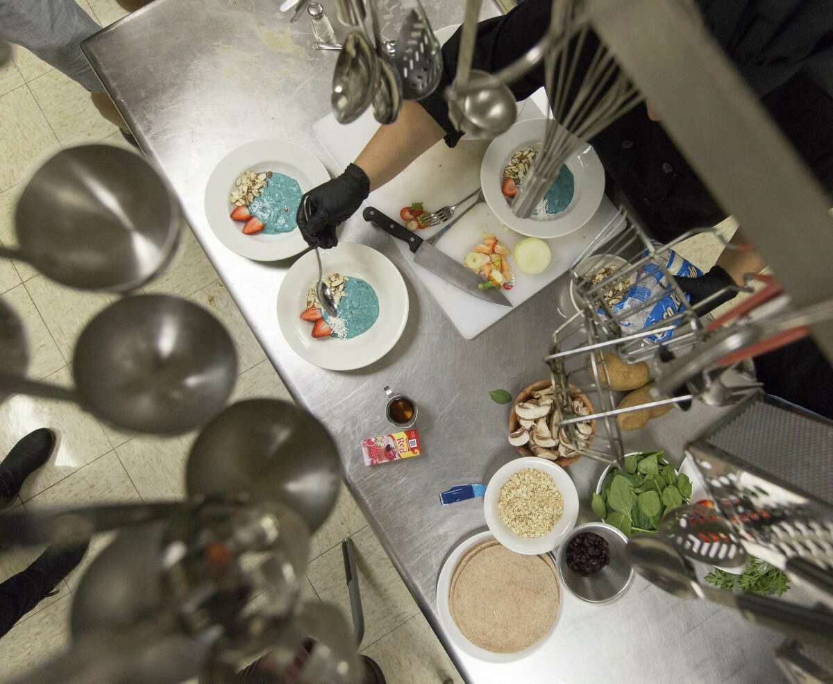 Students in a San Antonio cooking contest take on youth hunger