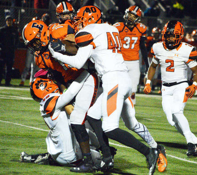 FOOTBALL: Tigers roar past Wildkits in opener