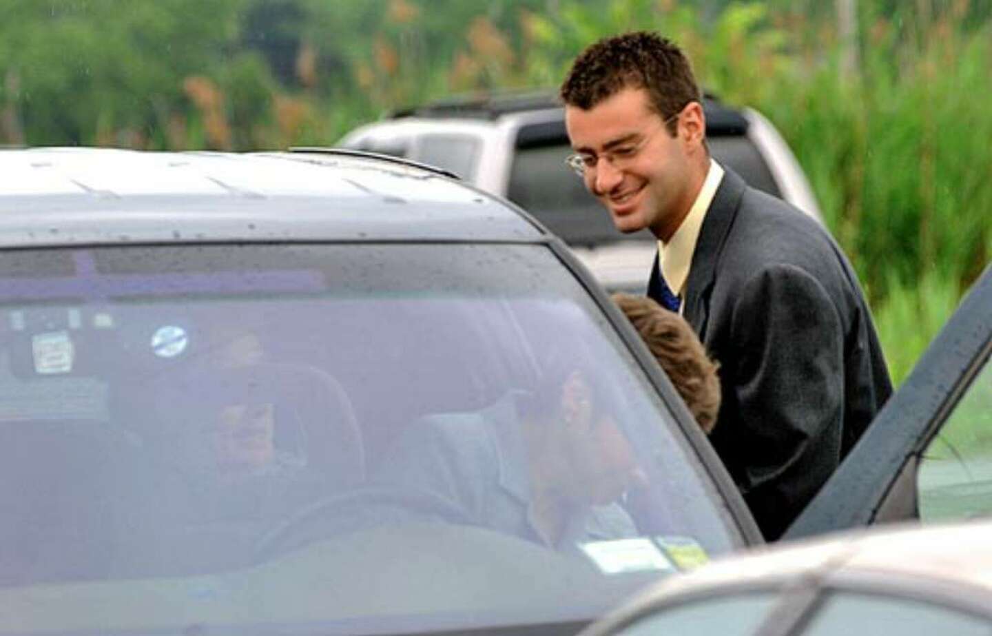 An unfamiliar face in a distant courtroom