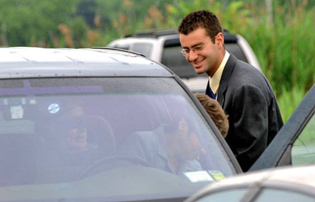 An unfamiliar face in a distant courtroom