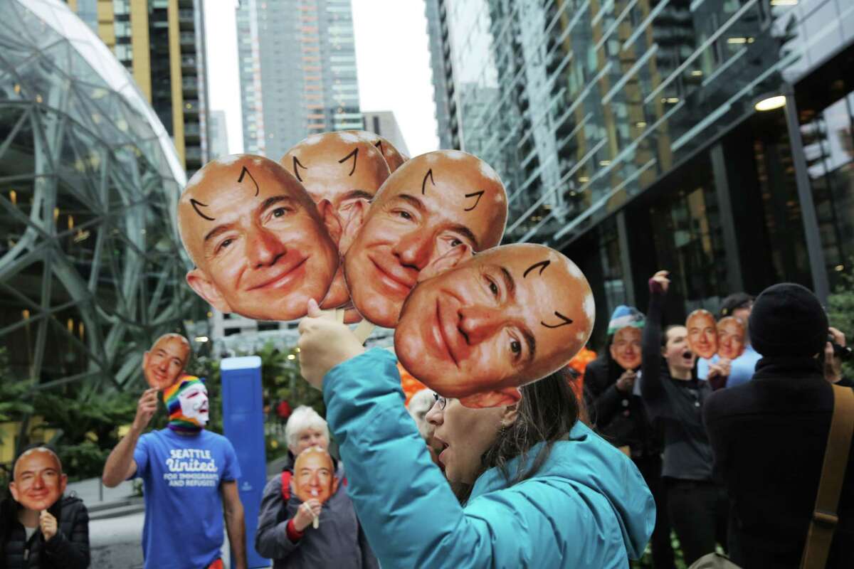 Dozens of Bezos faces protest Amazon facial recognition
