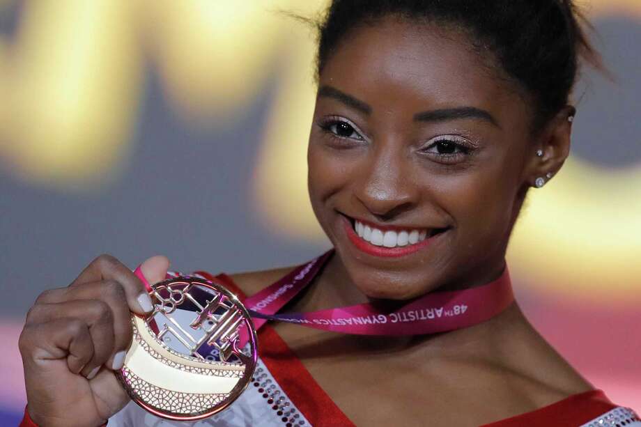 Simone Biles adds gold, silver to record worlds haul - Houston Chronicle