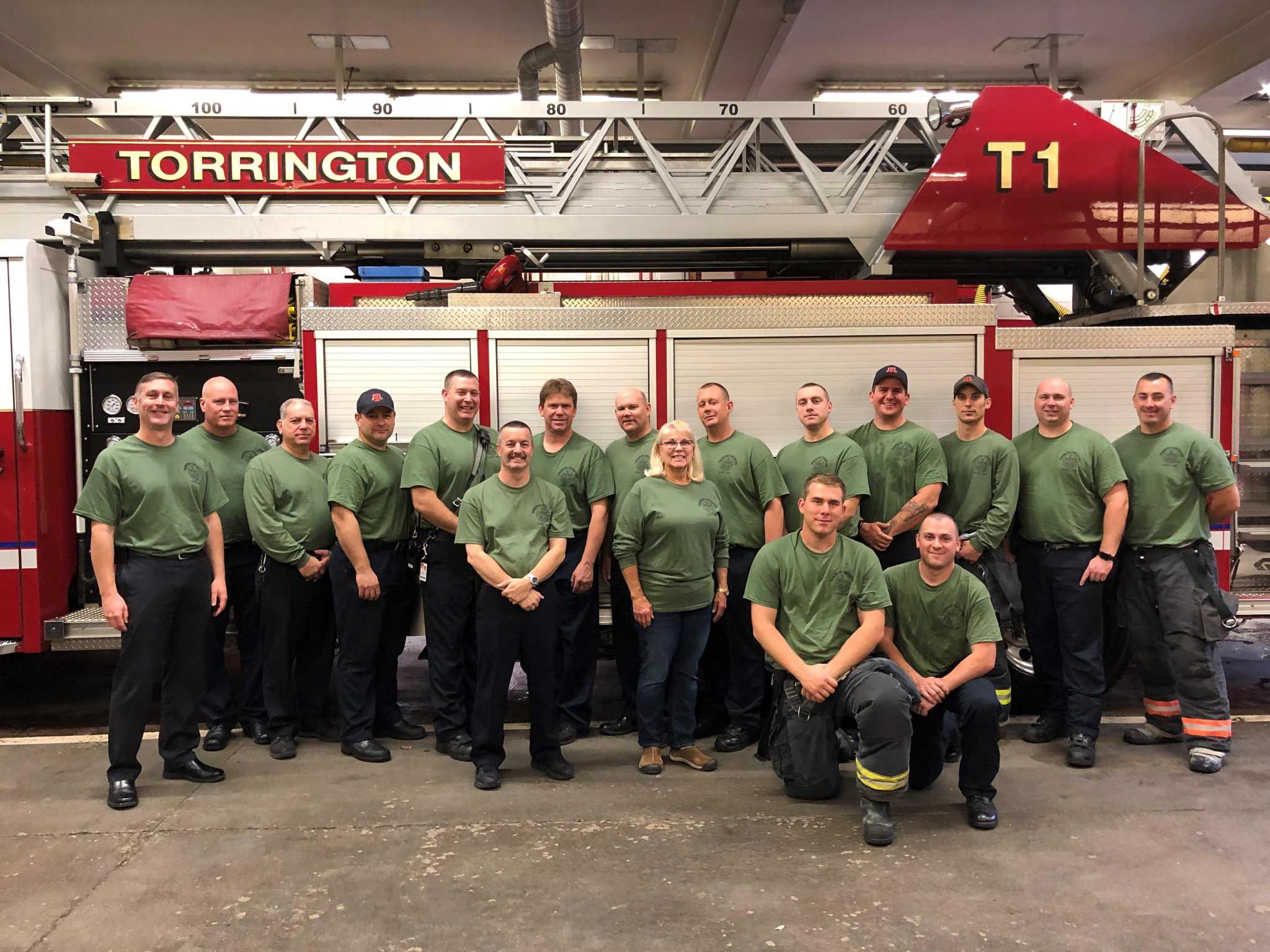 Torrington firefighters’ T-shirts signal support