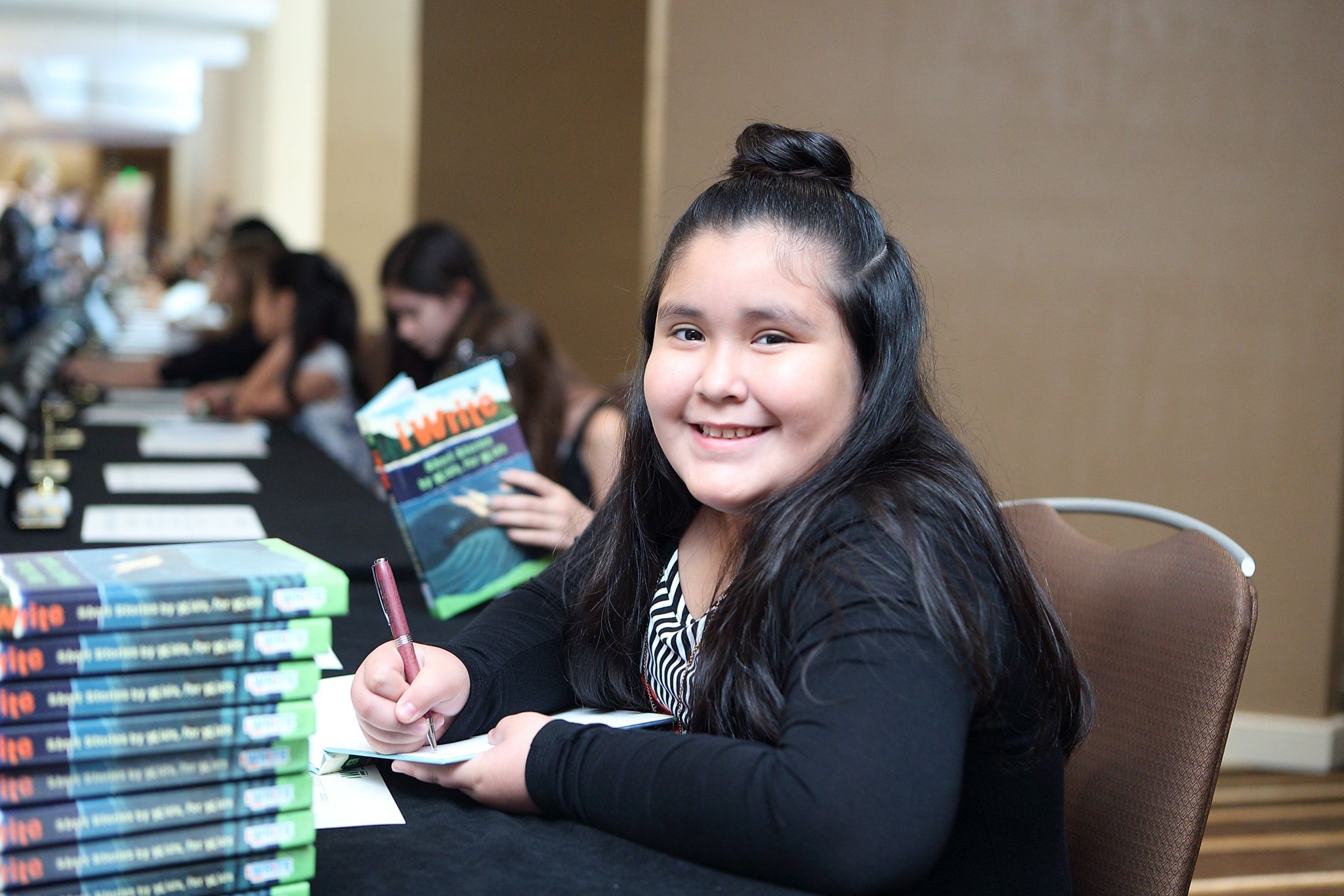 Children authors, illustrators shine at iWrite Literacy luncheon