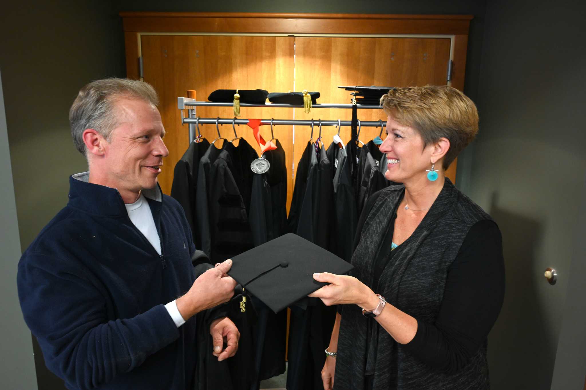 Caps and gowns get second march