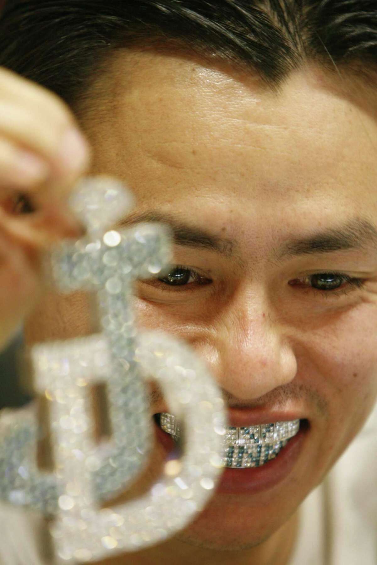 This is what it’s like waiting to meet Johnny Dang, Houston’s King of Bling