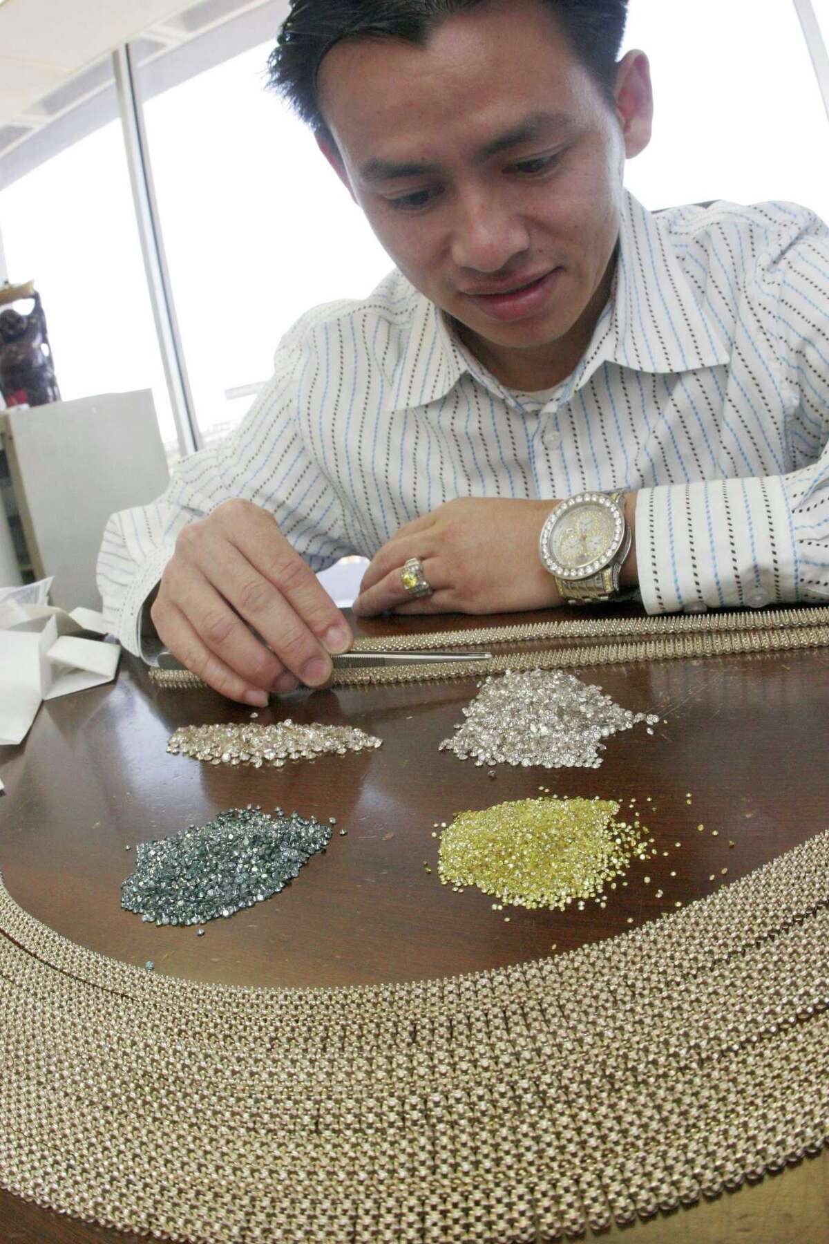 This is what it’s like waiting to meet Johnny Dang, Houston’s King of Bling