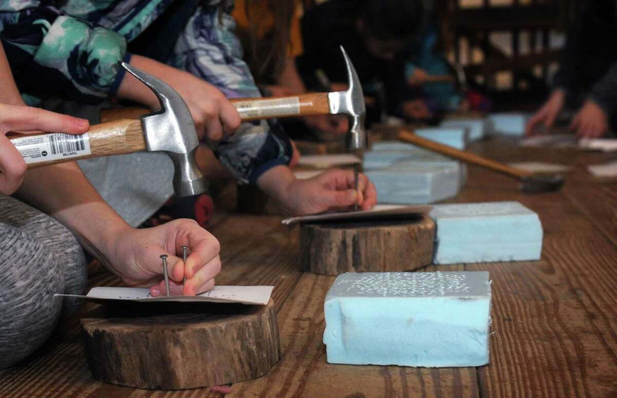 In photos: Learning how to tinsmith