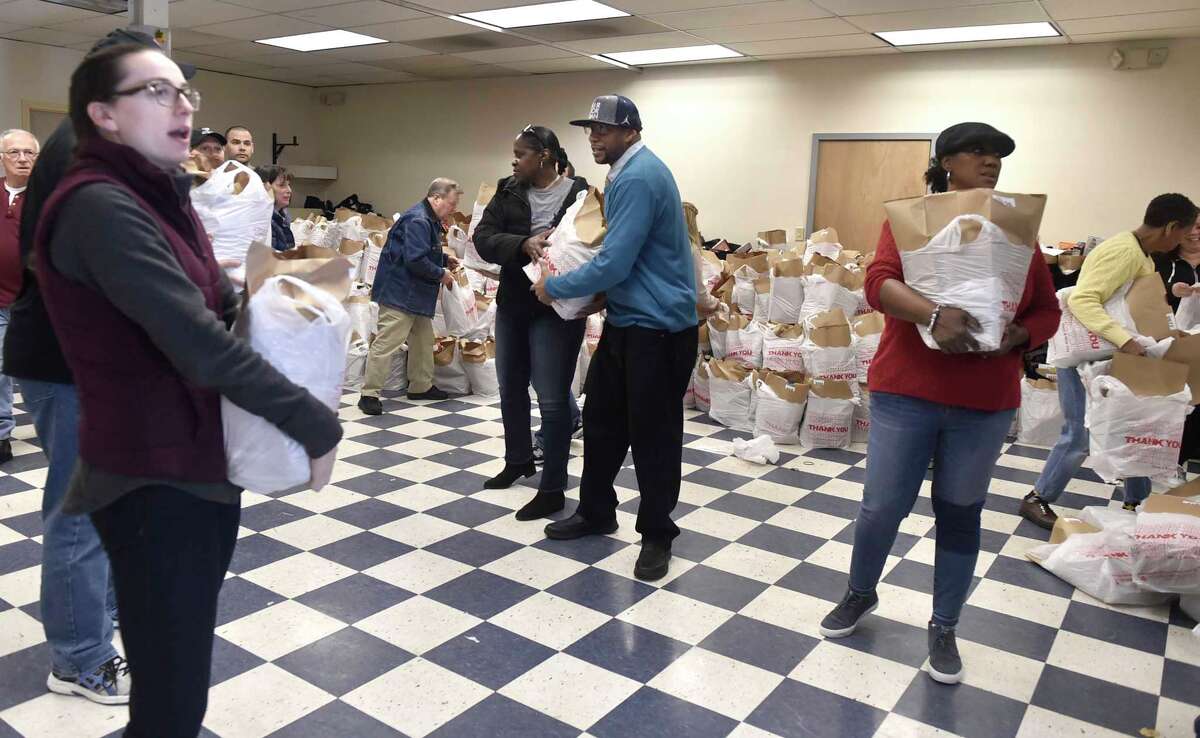 Christian Community Action of New Haven prepare Thanksgiving meals