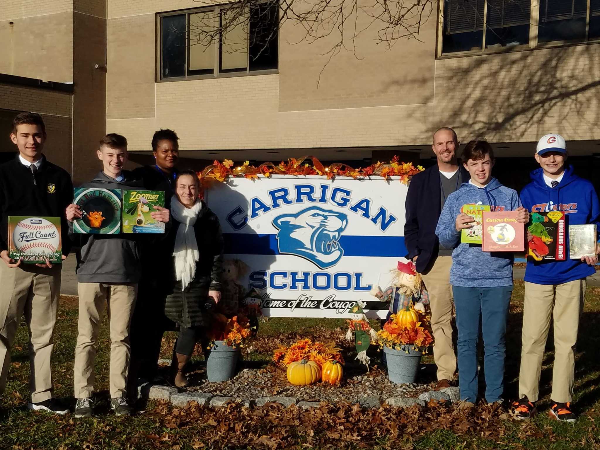 Orange training academy donates 500 books to Carrigan Intermediate ...