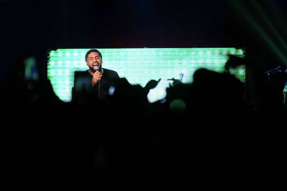 Former Texans player Arian Foster unveils Bobby Feeno onstage