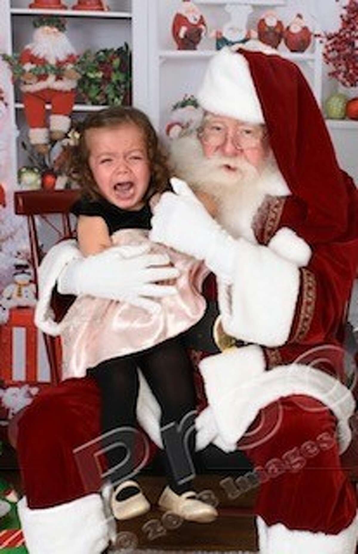PHOTOS: Adorable kids crying on Santa's lap will make your day