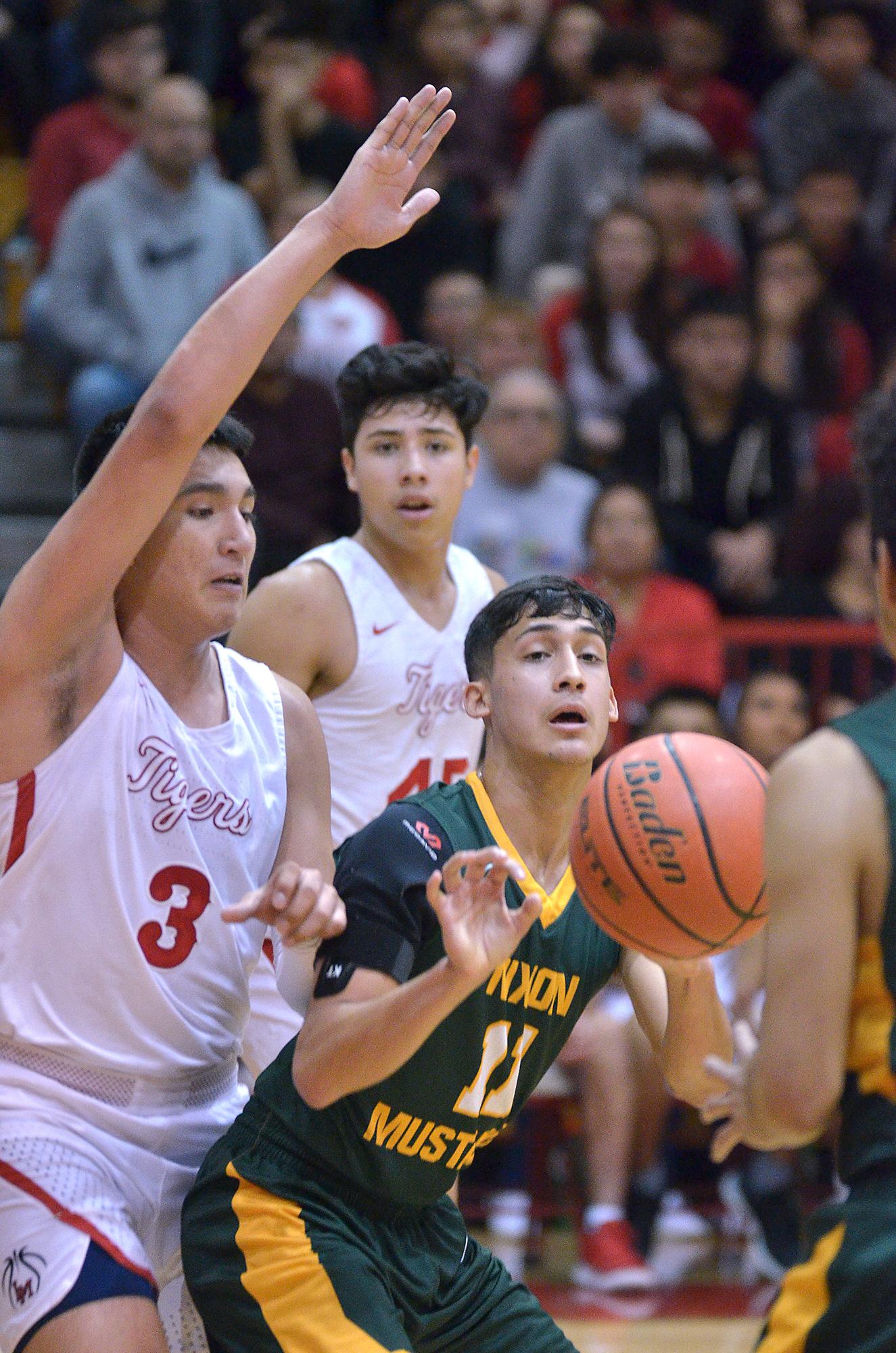Nixon rebounds with rivalry win