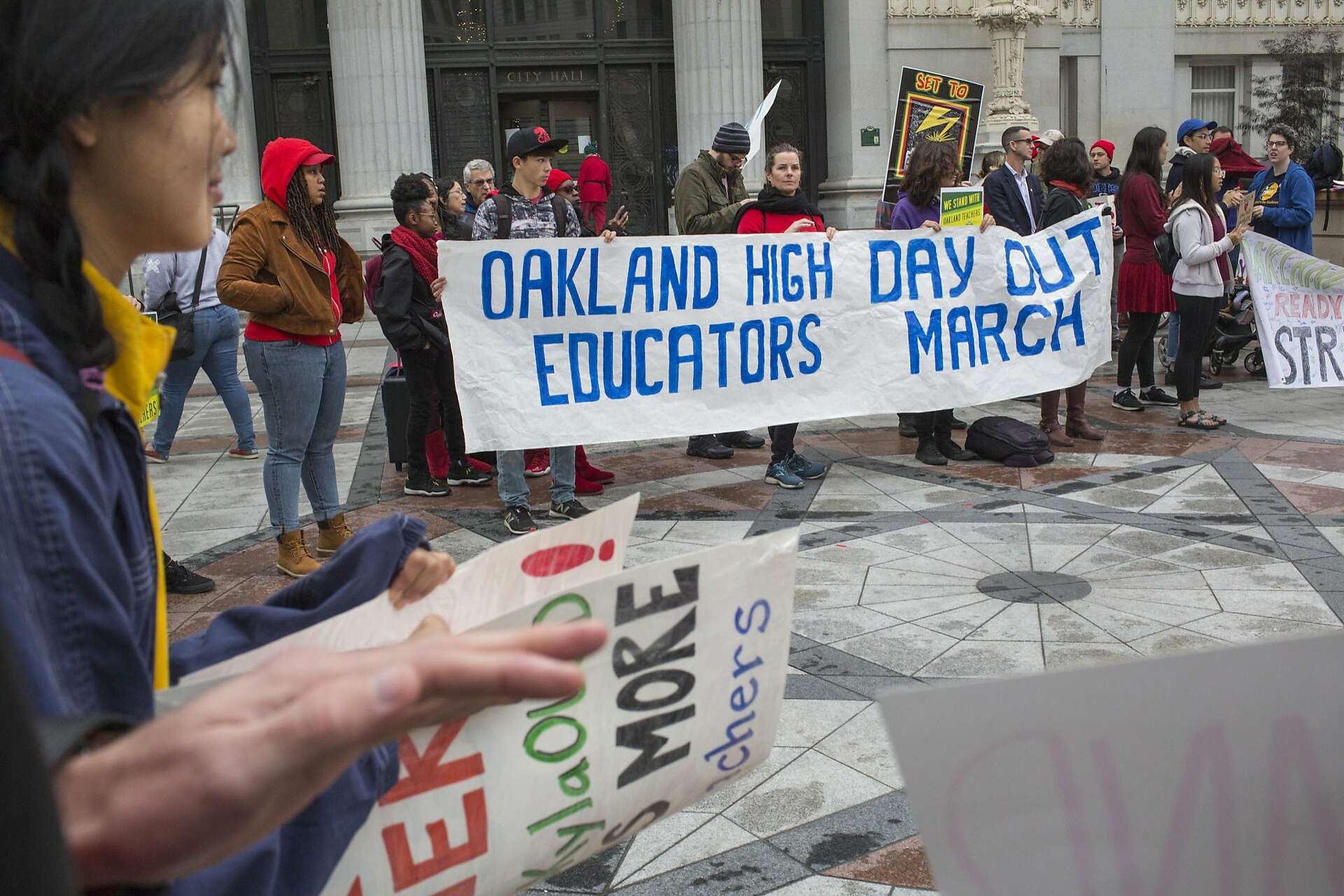 Oakland High teachers walk out to protest pay; district considers ...