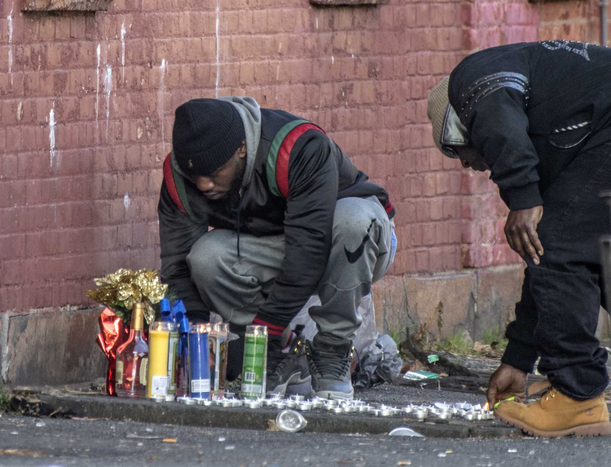 Blood stain, memorial mark Albany's 15th homicide in 2018