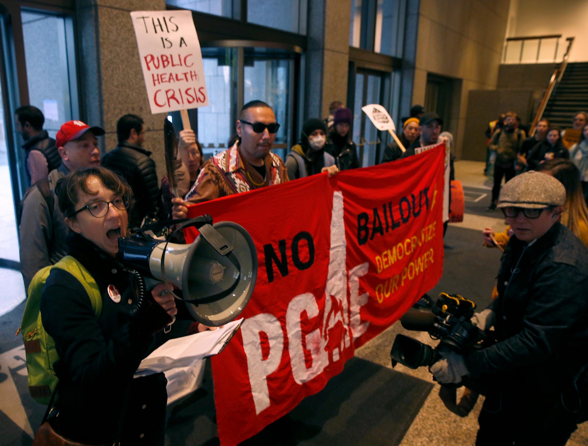 Protesters march on PG&E offices amid Camp Fire fallout