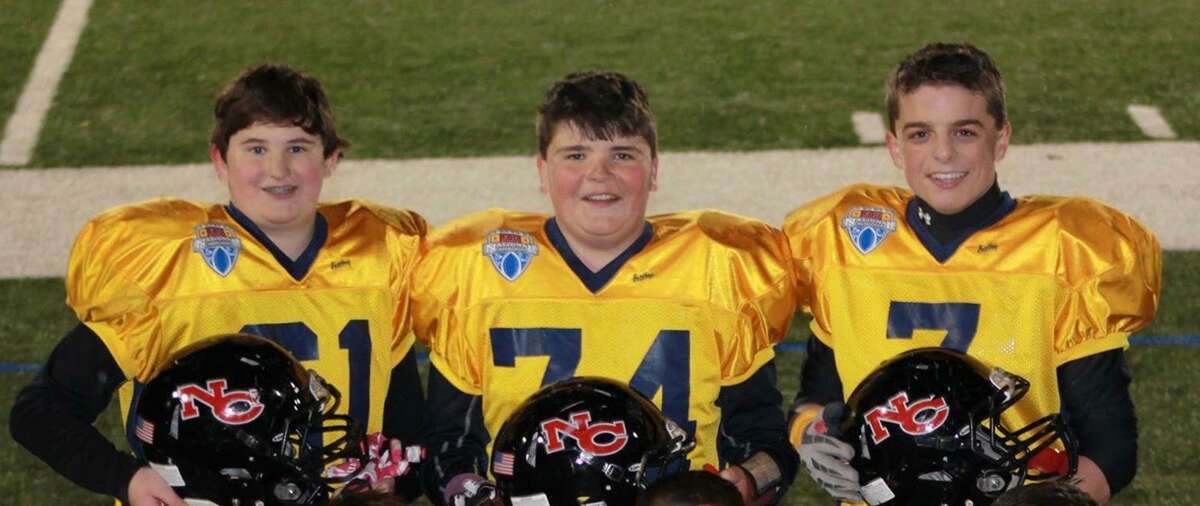 New Canaan’s Braden, Conley, Stewart sign to play Division I football