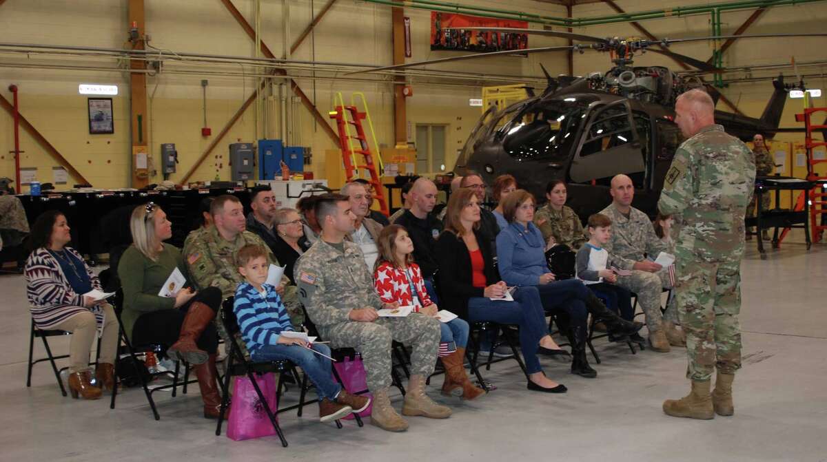 Family members soldiers mark Army pilot's final flight