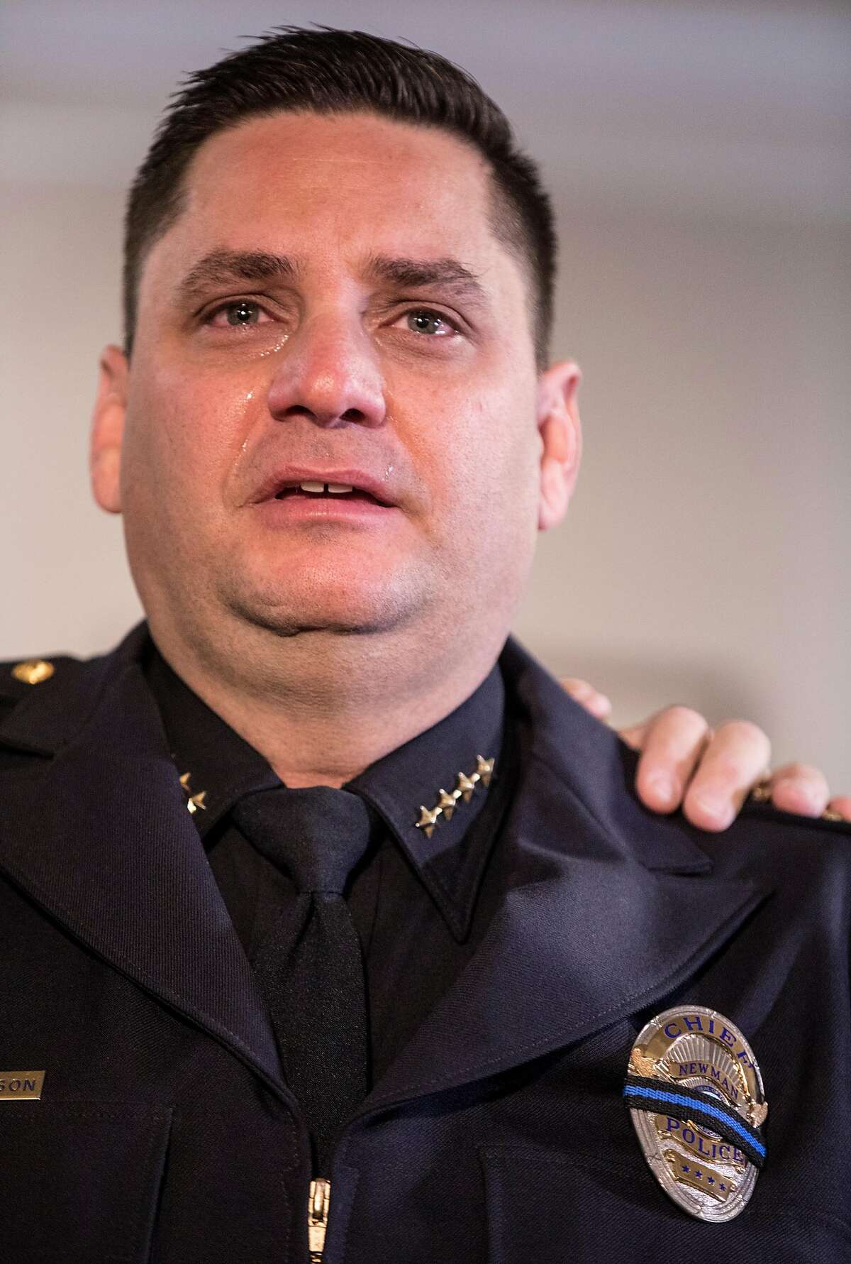 The tiny town of Newman reels as hunt for cop killer grows, Trump ...