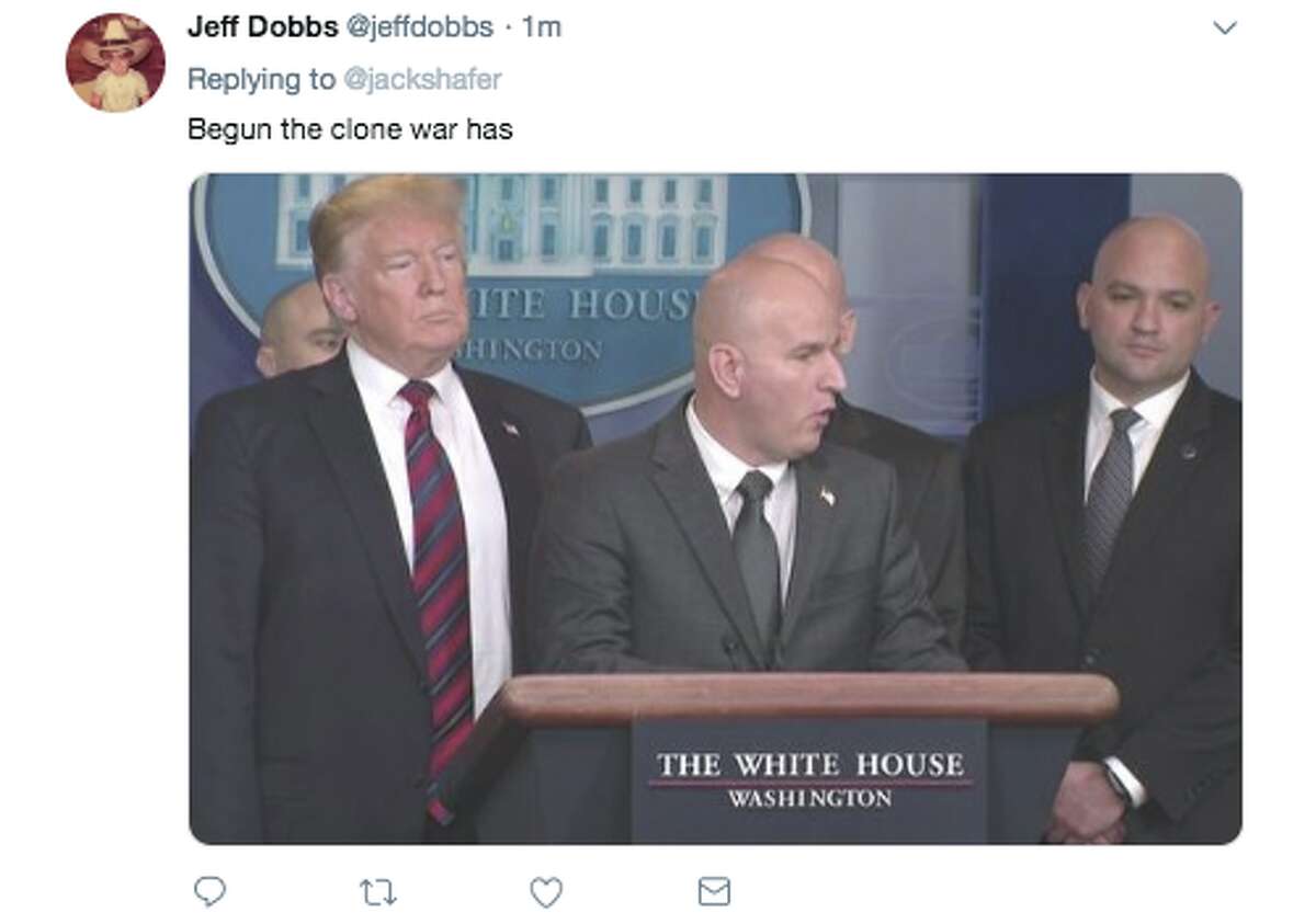 Twitter can't get over the people standing behind Trump in question ...