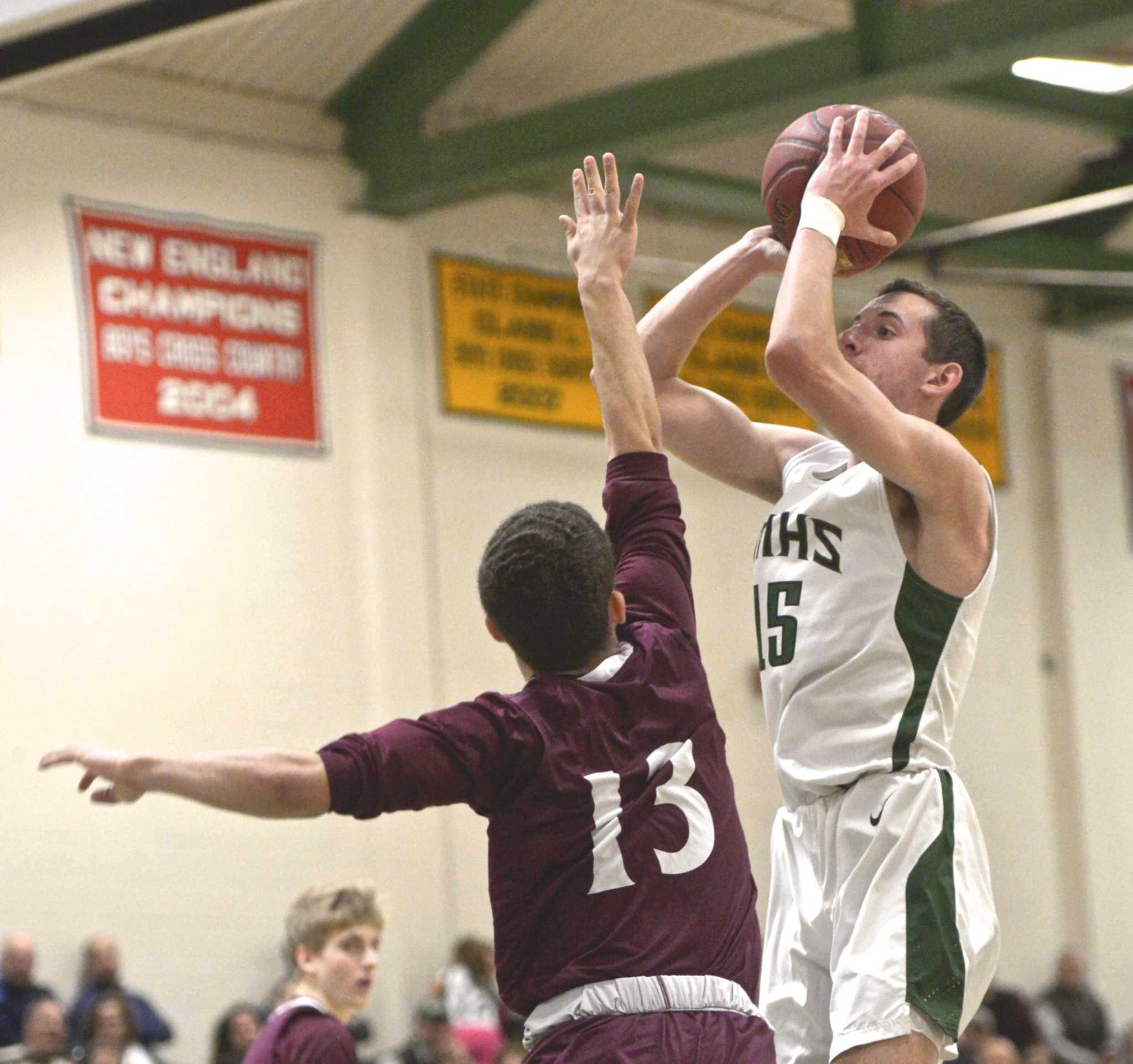 New Milford dominates boards in win over Bethel
