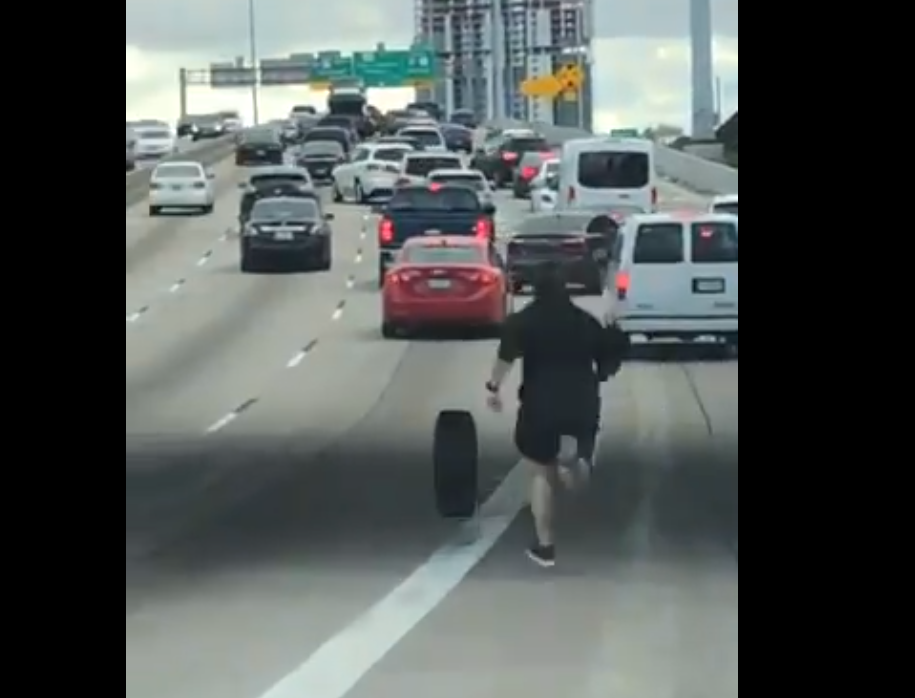 Man caught on video chasing tire down Interstate 45