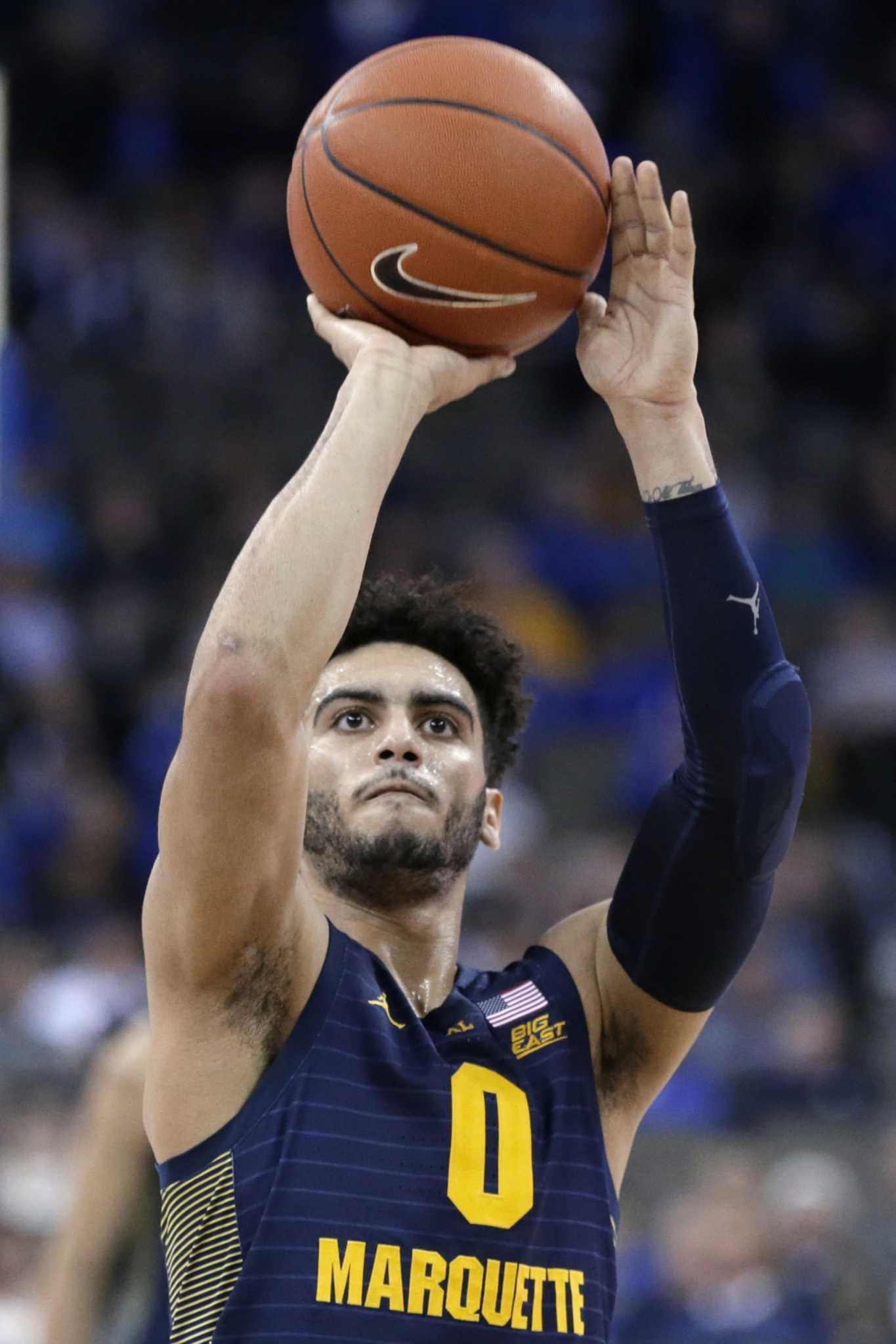 Howard has 53 in Marquette's win