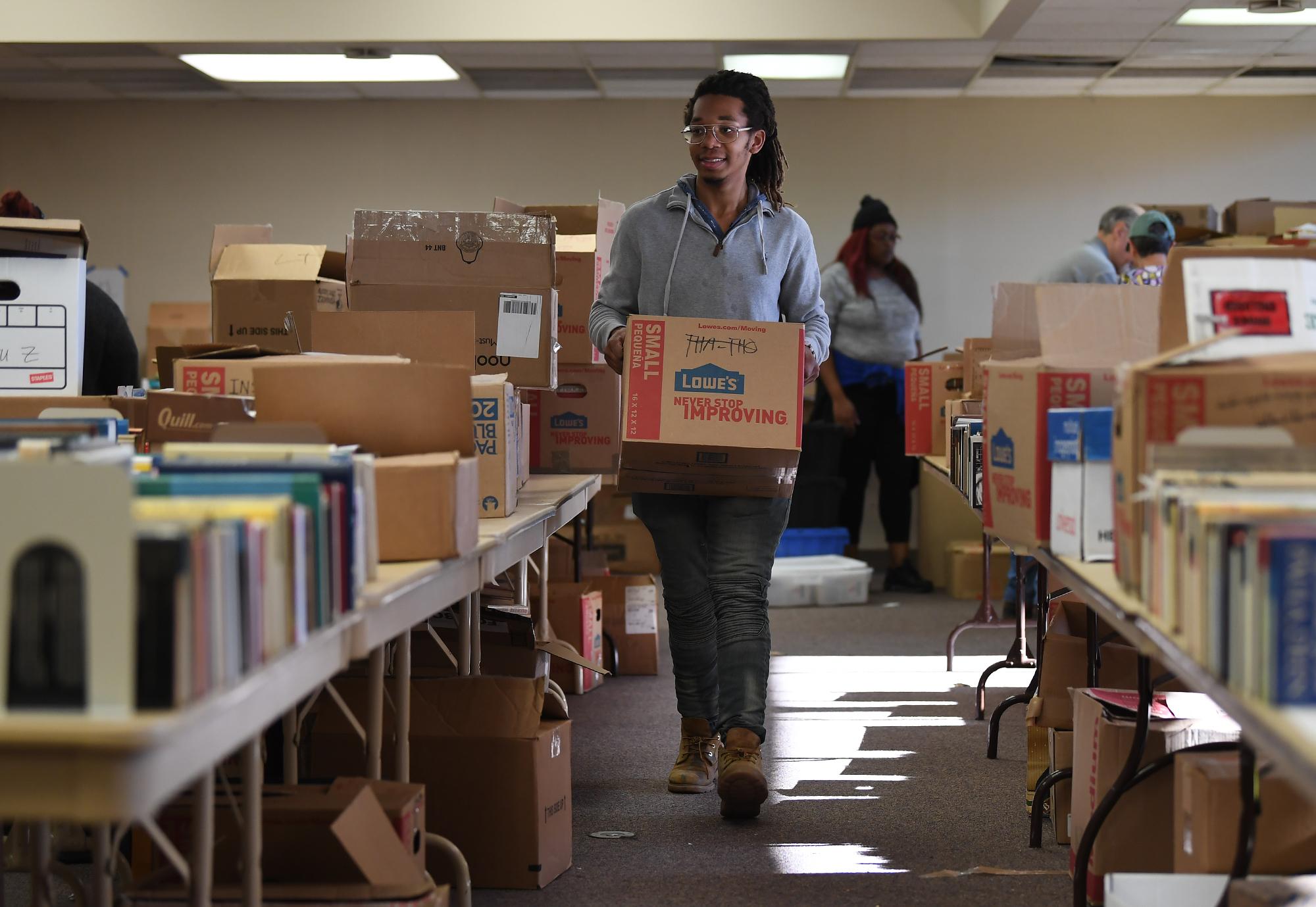 Beaumont Library Friends pitch books for 10 cents apiece