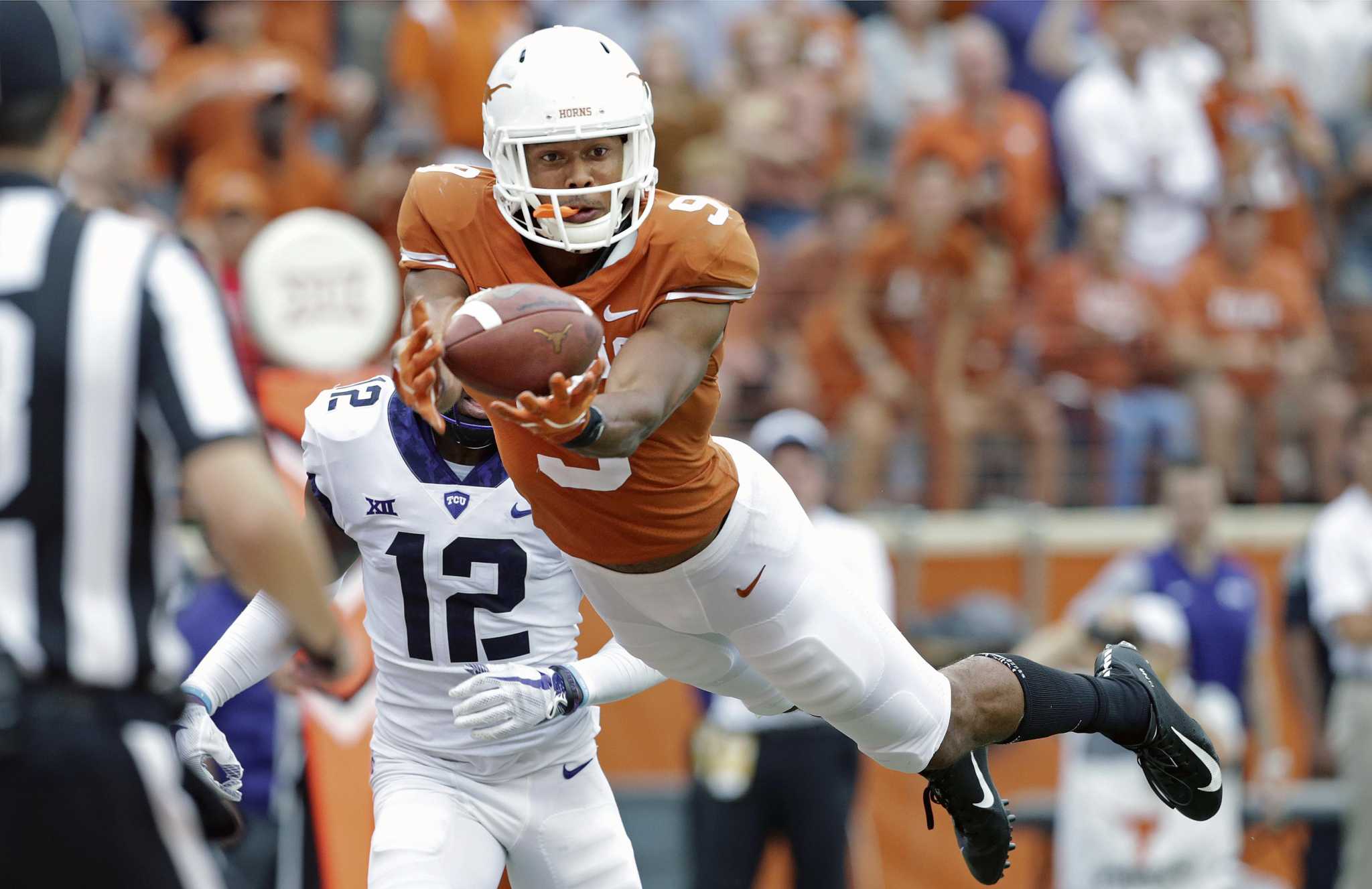 Compelled by title dreams and family, Texas WR Collin Johnson holds off ...