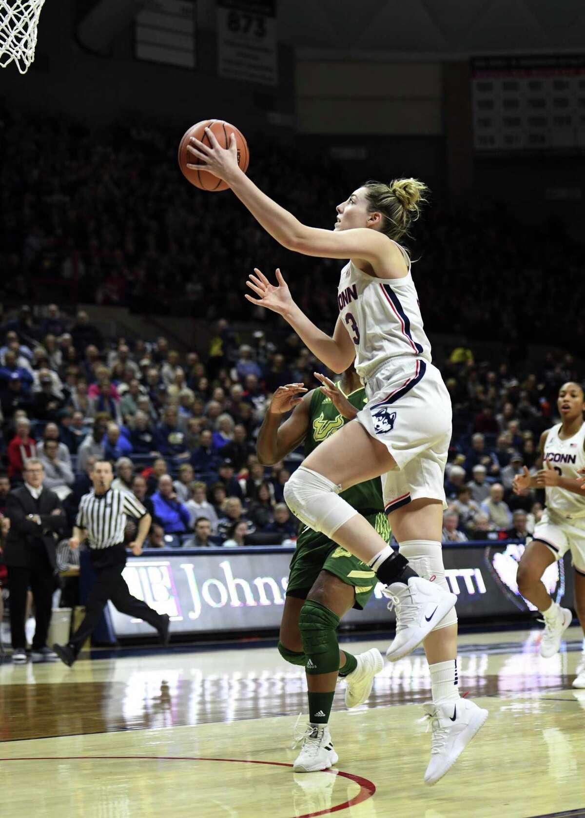 UConn pulls away for sloppy win over USF
