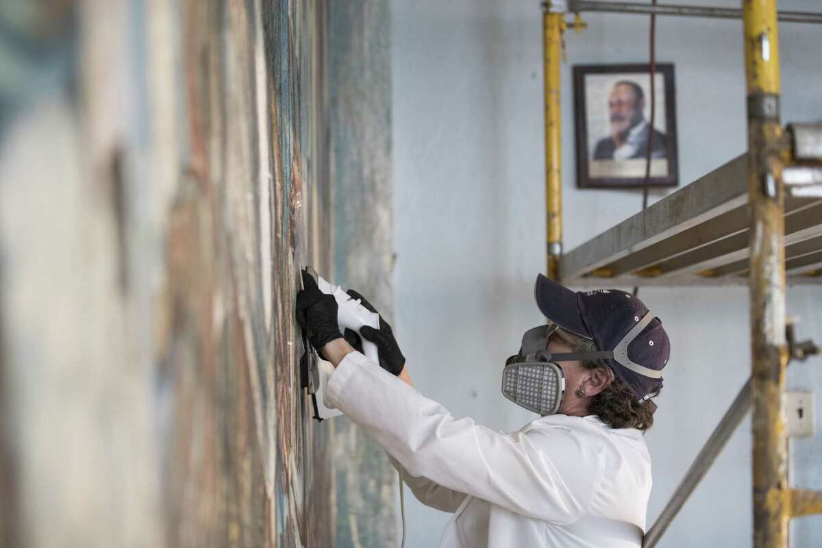 Restoration of historic John Biggers mural underway