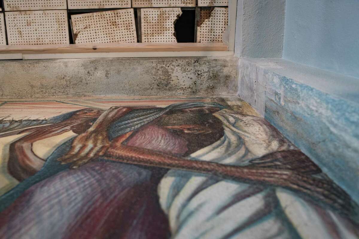 Restoration of historic John Biggers mural underway